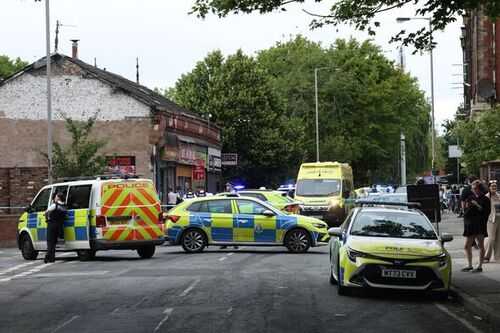 Urgent manhunt after person shot inside Liverpool café before armed ...