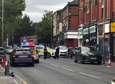 Urgent manhunt after person shot inside Liverpool café before armed ...