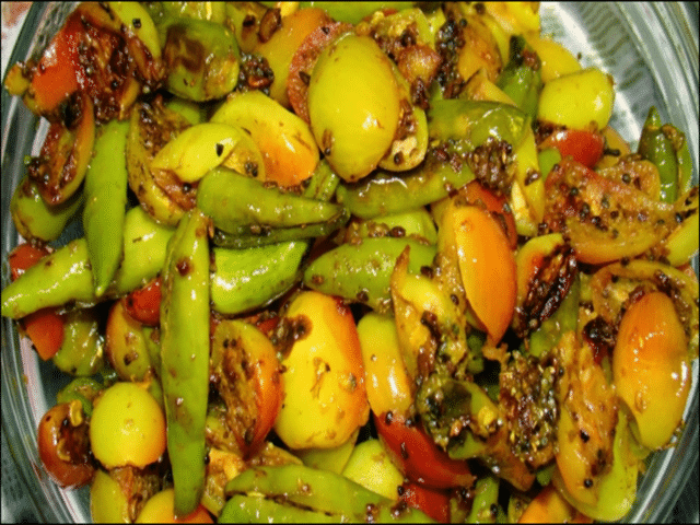 The tangy green chili and karonda pickle will double the flavor of even ...